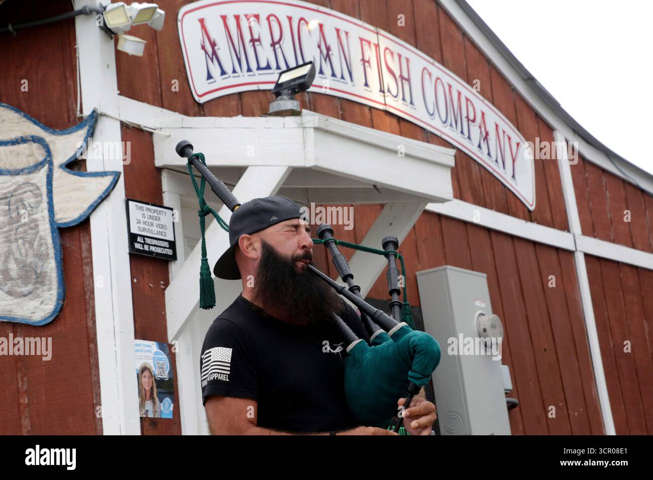 Joey Whitaker from Holden Beach plays "Amazing Grace" on the bagpipes ...
