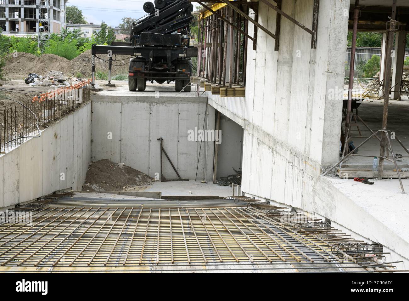 Reinforced concrete foundation under construction showing steel rebar ...