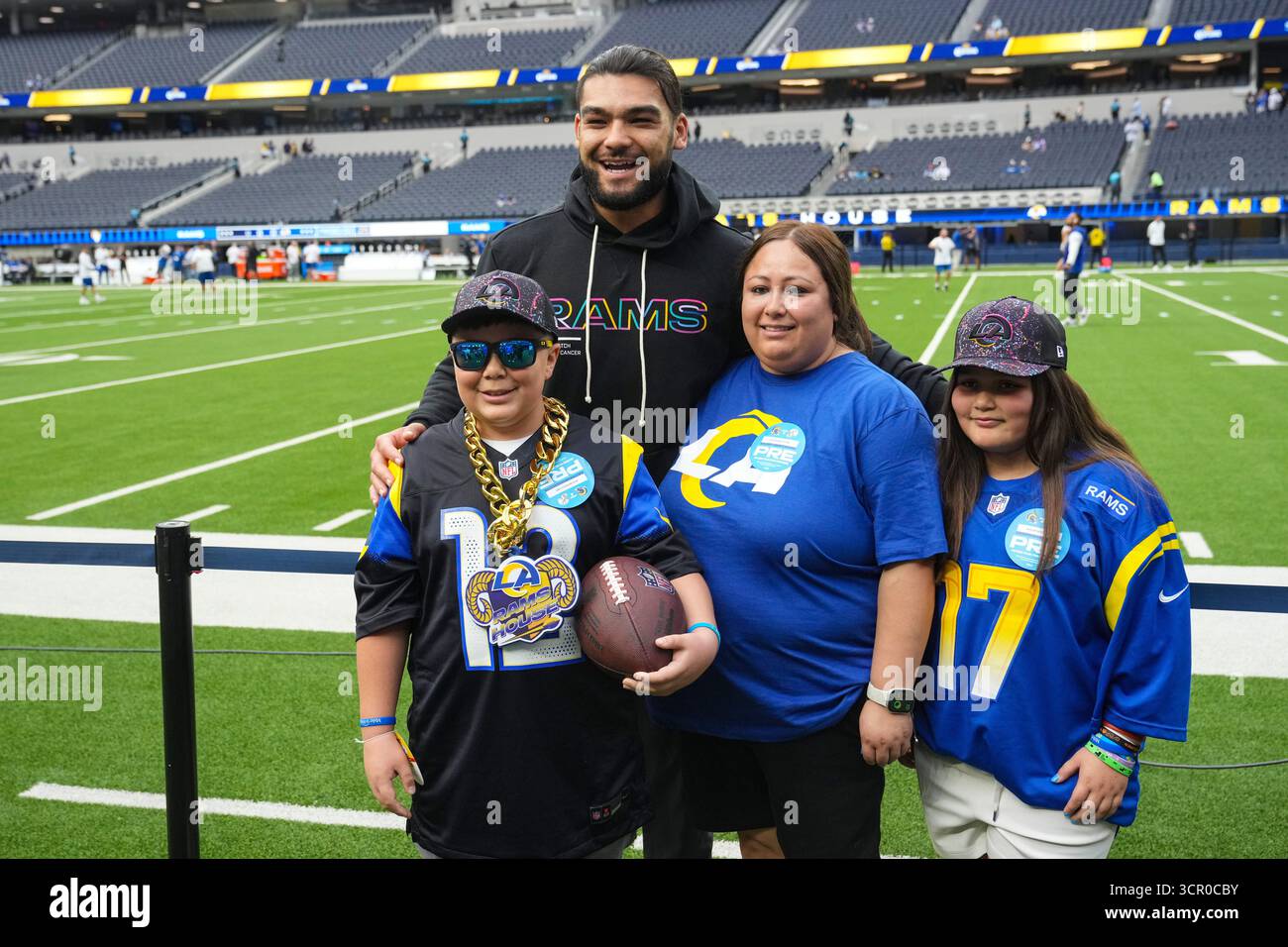 Los Angeles Rams wide receiver Puka Nacua (12) poses with fans before ...