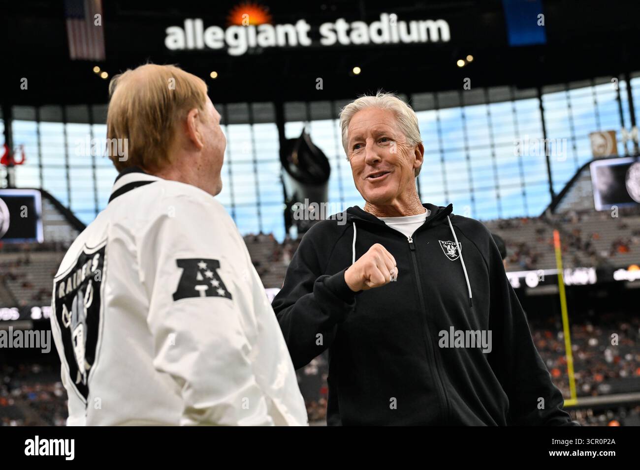 Las Vegas Raiders owner Mark Davis, left, and head coach Pete Carroll ...