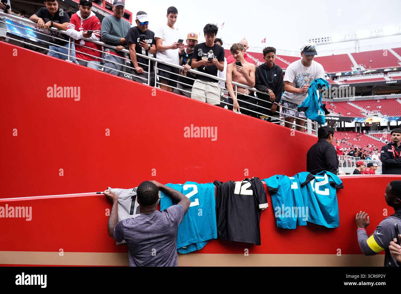 Jacksonville Jaguars wide receiver/defensive back Travis Hunter, bottom ...