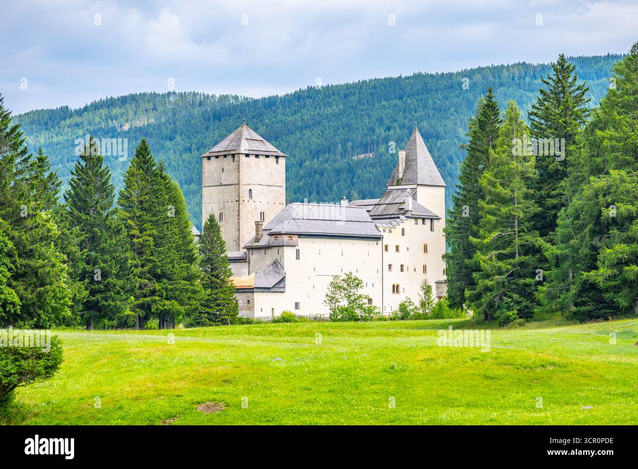 Mauterndorf Castle stands majestically among lush greenery, surrounded ...