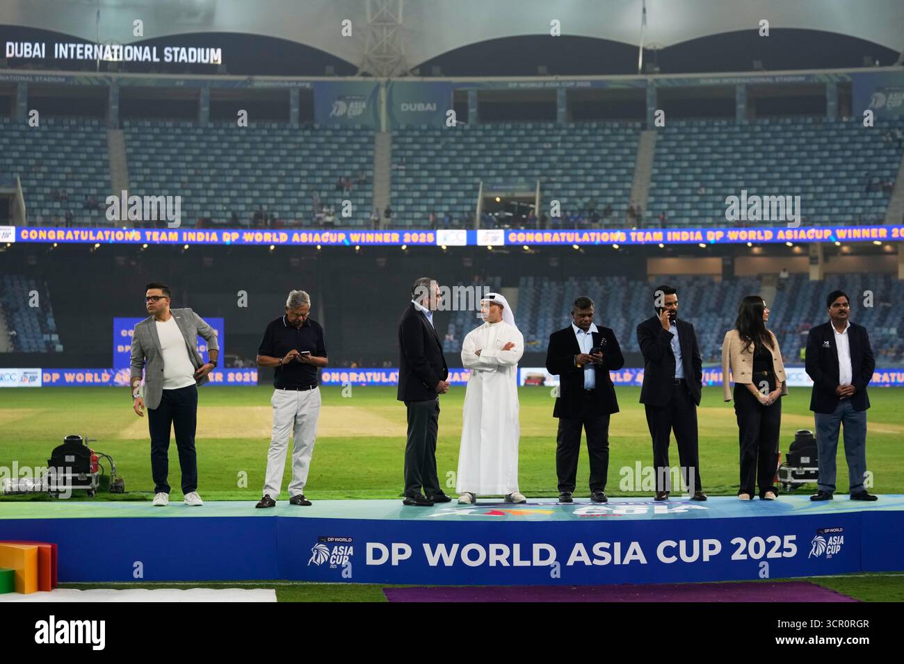Dignitaries wait on the presentation platform after India won the Asia ...