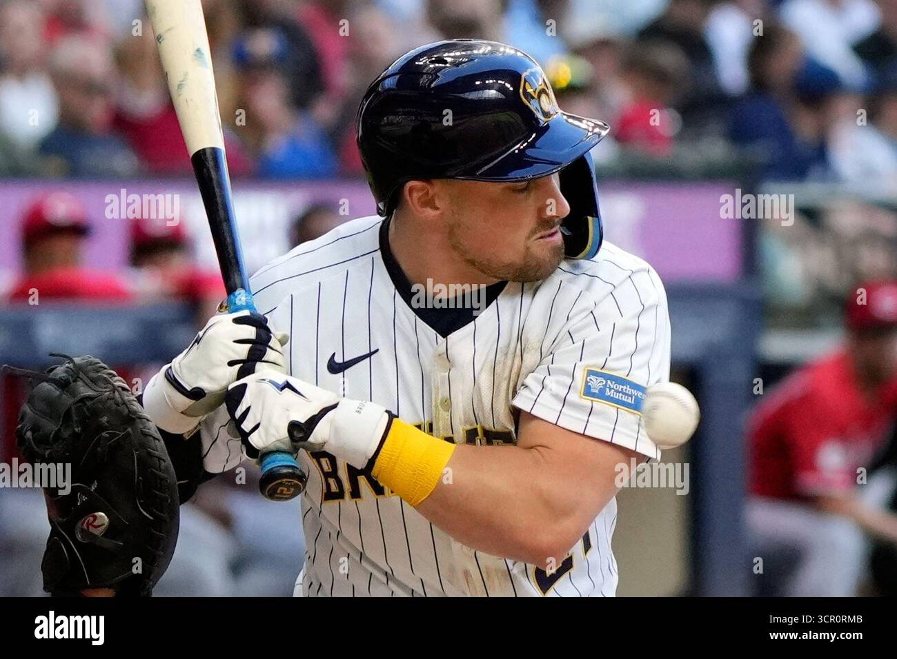 Milwaukee Brewers' Caleb Durbin is hit by a pitch during the second ...