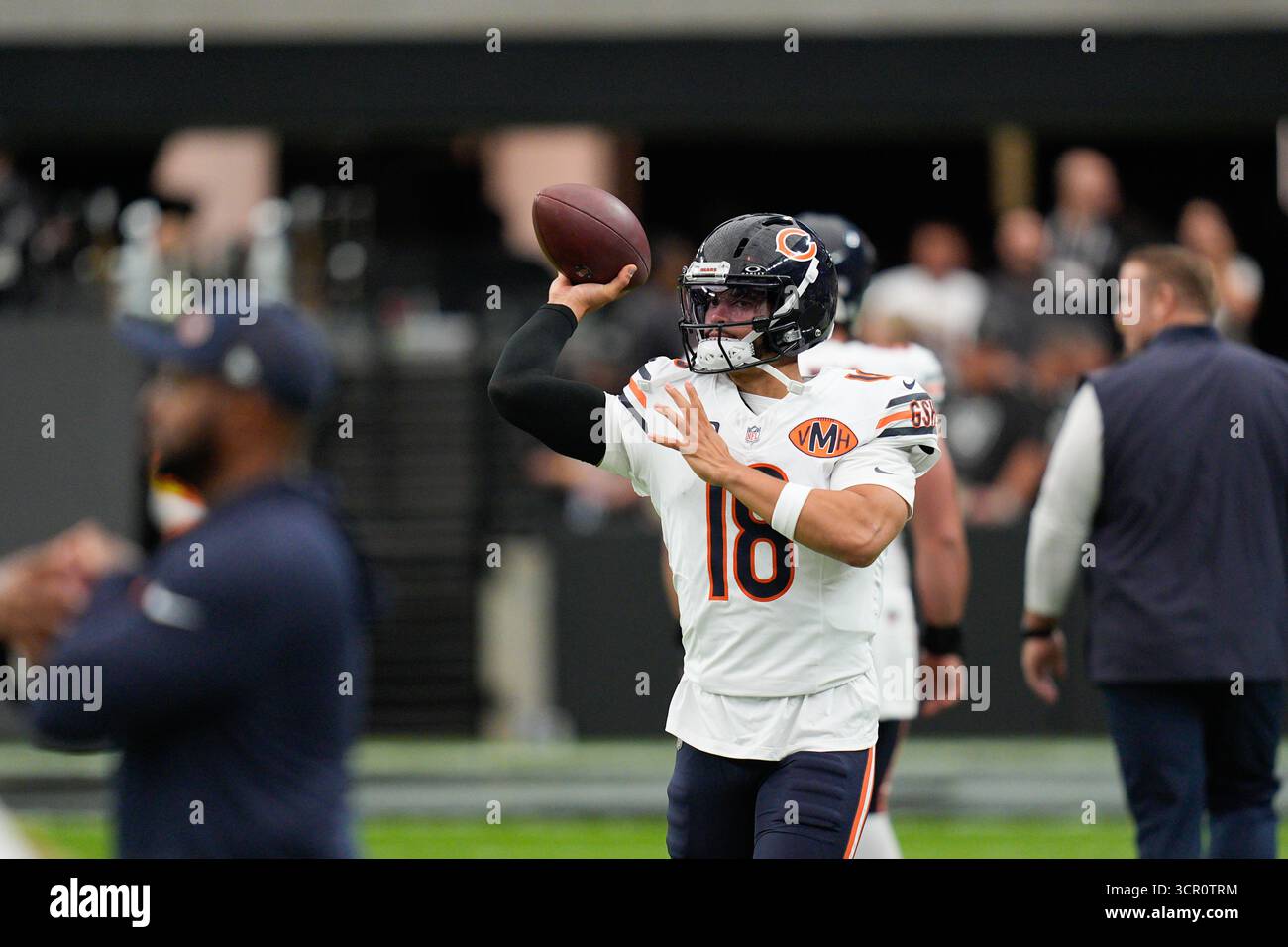 Chicago Bears quarterback Caleb Williams (18) warms up before the team ...