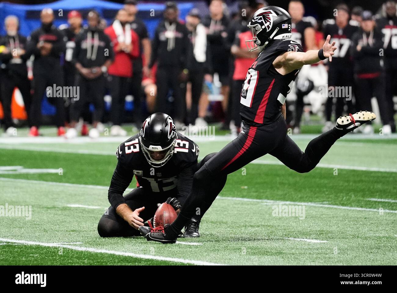 Atlanta Falcons placekicker Parker Romo (39), with punter Bradley ...