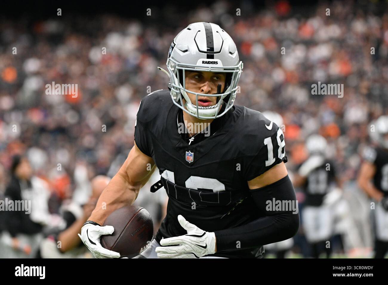 Las Vegas Raiders wide receiver Jack Bech (18) warms up before the team ...