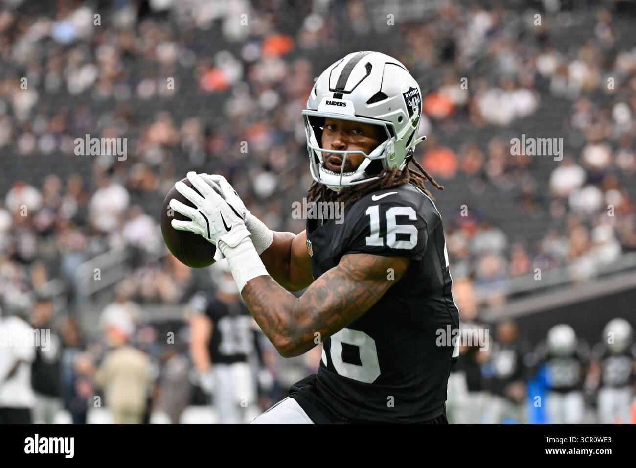 Las Vegas Raiders wide receiver Jakobi Meyers (16) warms up before the team's NFL football game ...