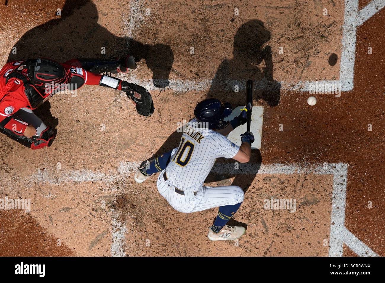 Milwaukee Brewers' Sal Frelick bunts during the third inning of a ...
