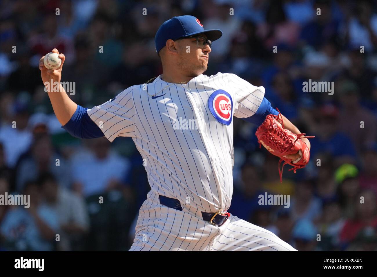 Chicago Cubs starting pitcher Javier Assad throws against the St. Louis ...