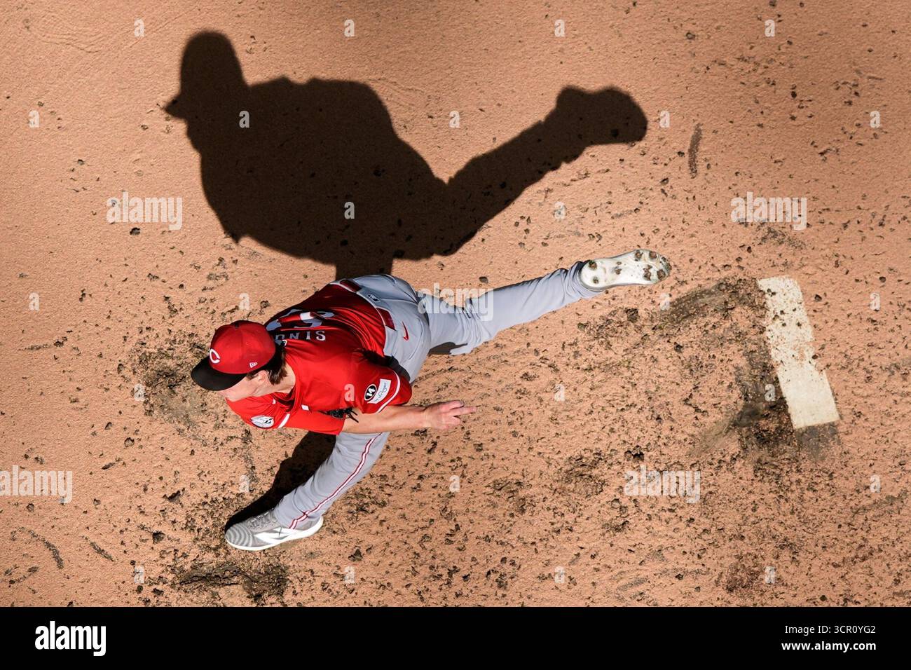 Cincinnati Reds' Brady Singer throws during the fourth inning of a ...