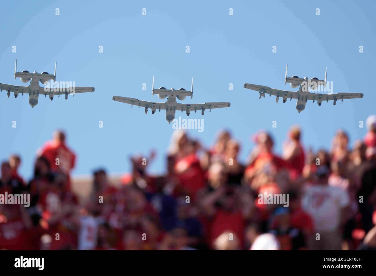 Aircraft perform a flyover before the start of an NFL football game ...