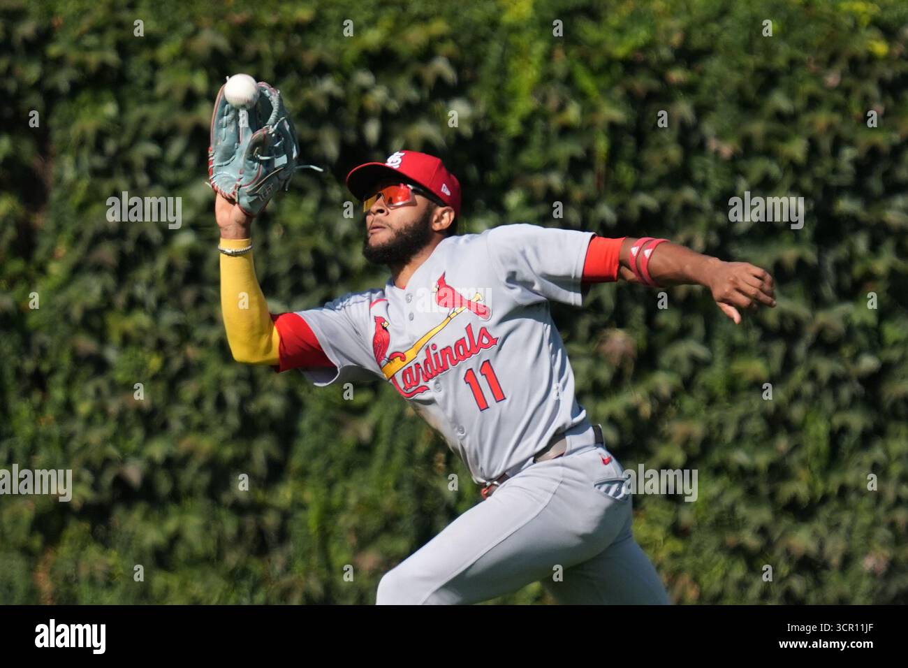 St. Louis Cardinals center fielder Victor Scott II catches a fly ball ...