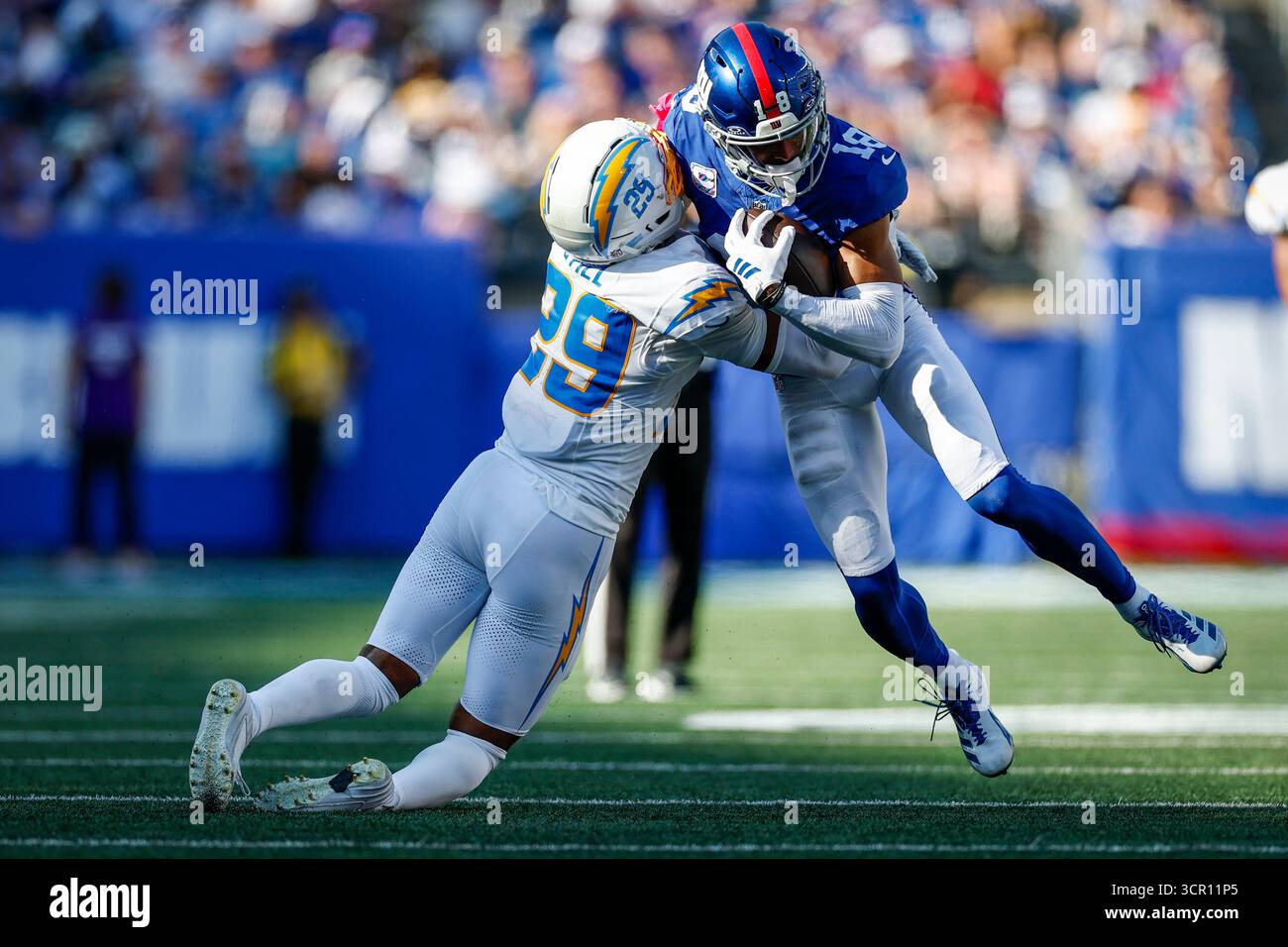 New York Giants wide receiver Darius Slayton (18) is tackled by Los ...