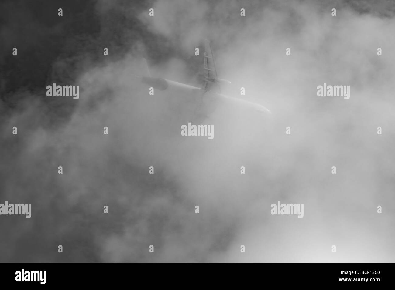 Airliner aircraft approaching airport Black and White Stock Photos ...