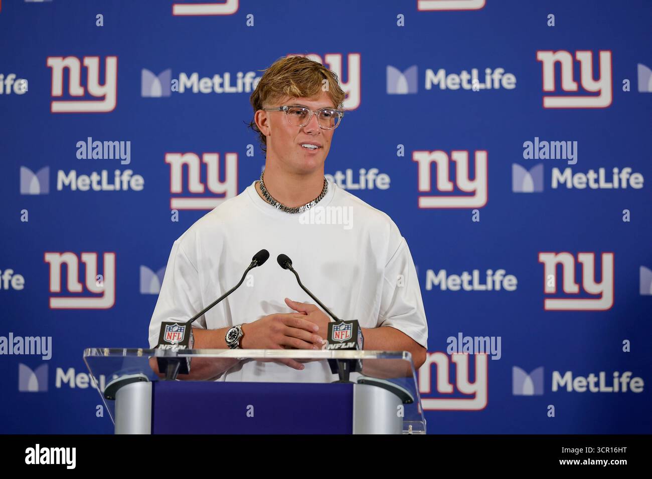 New York Giants quarterback Jaxson Dart answers questions during a news ...