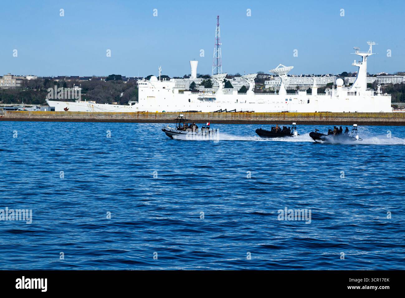 French military motorboats moving near the principal naval base in the ...