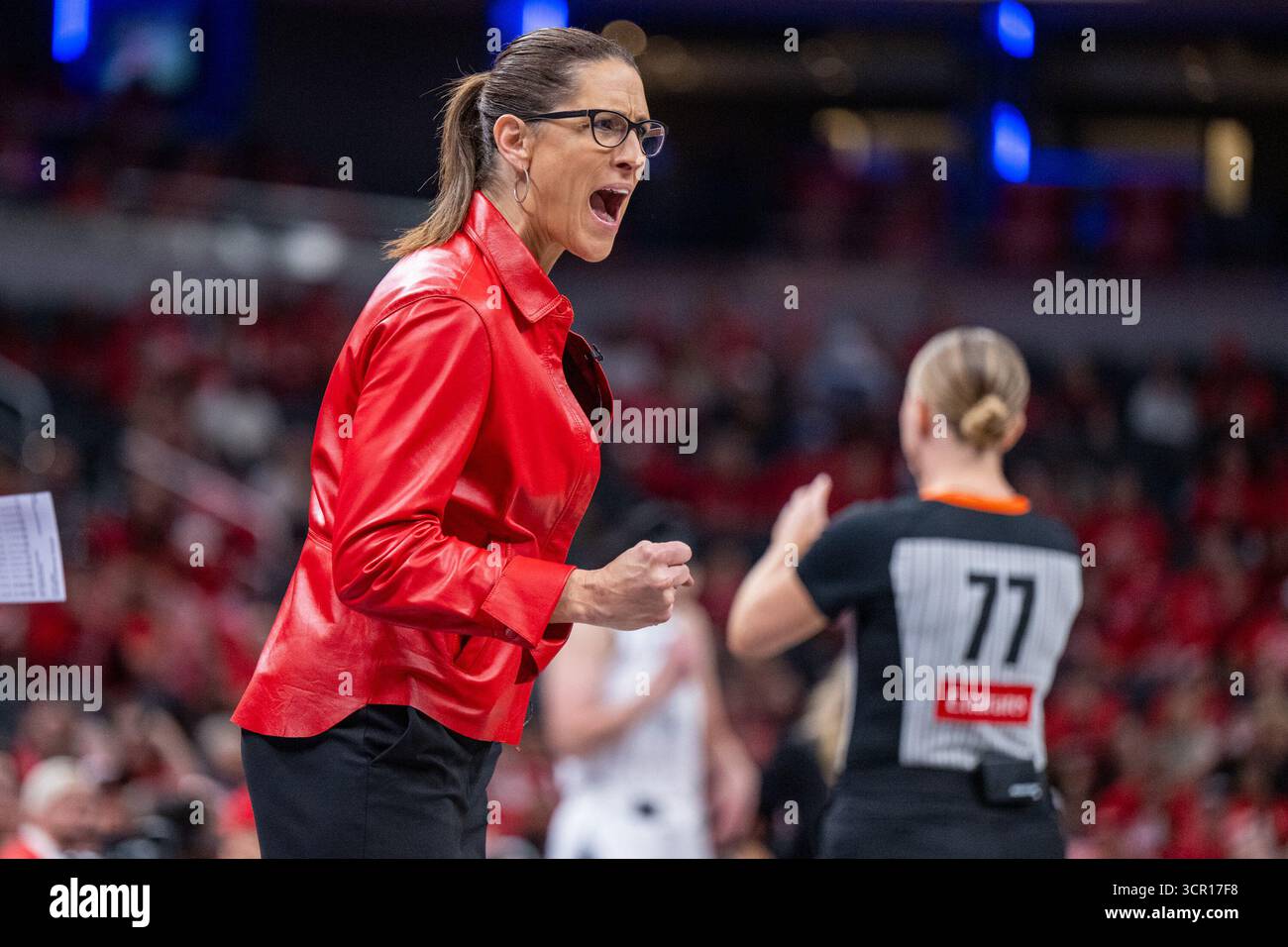 Indiana Fever head coach Stephanie White reacts during the second half of Game 4 of a WNBA ...