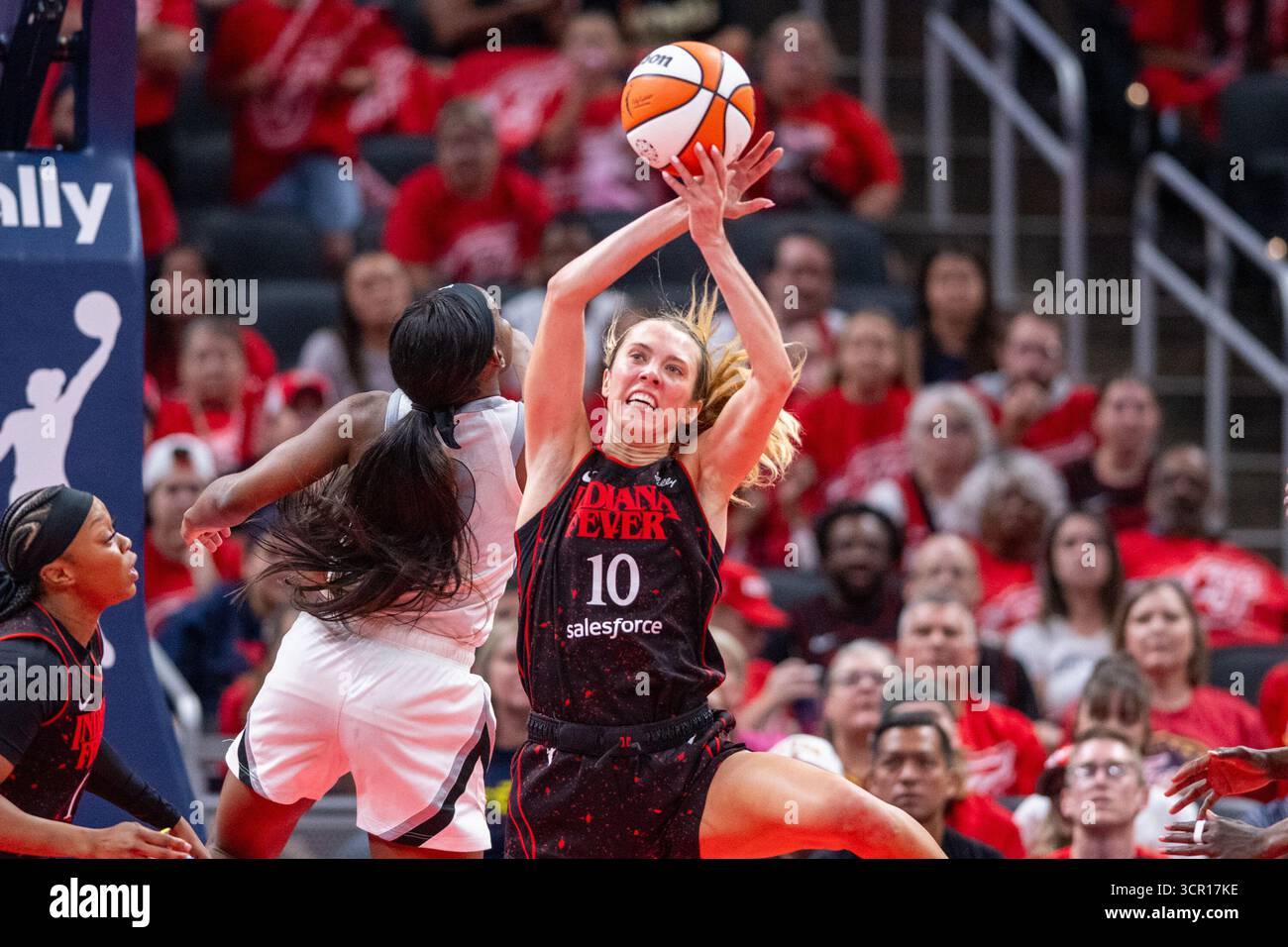 Indiana Fever guard Lexie Hull (10) reaches for a rebound during the ...