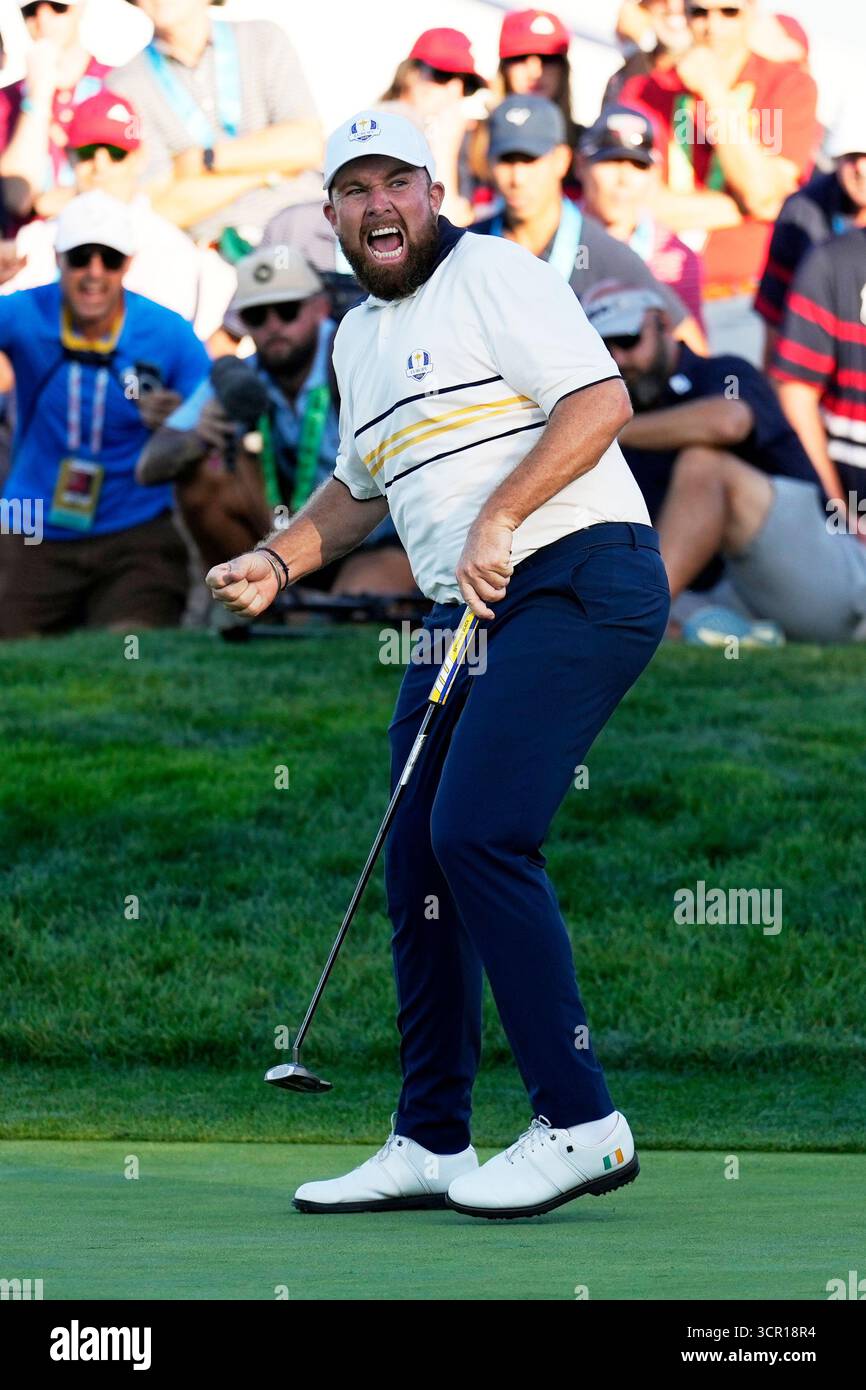 Europe's Shane Lowry celebrates after making the winning putt on the ...