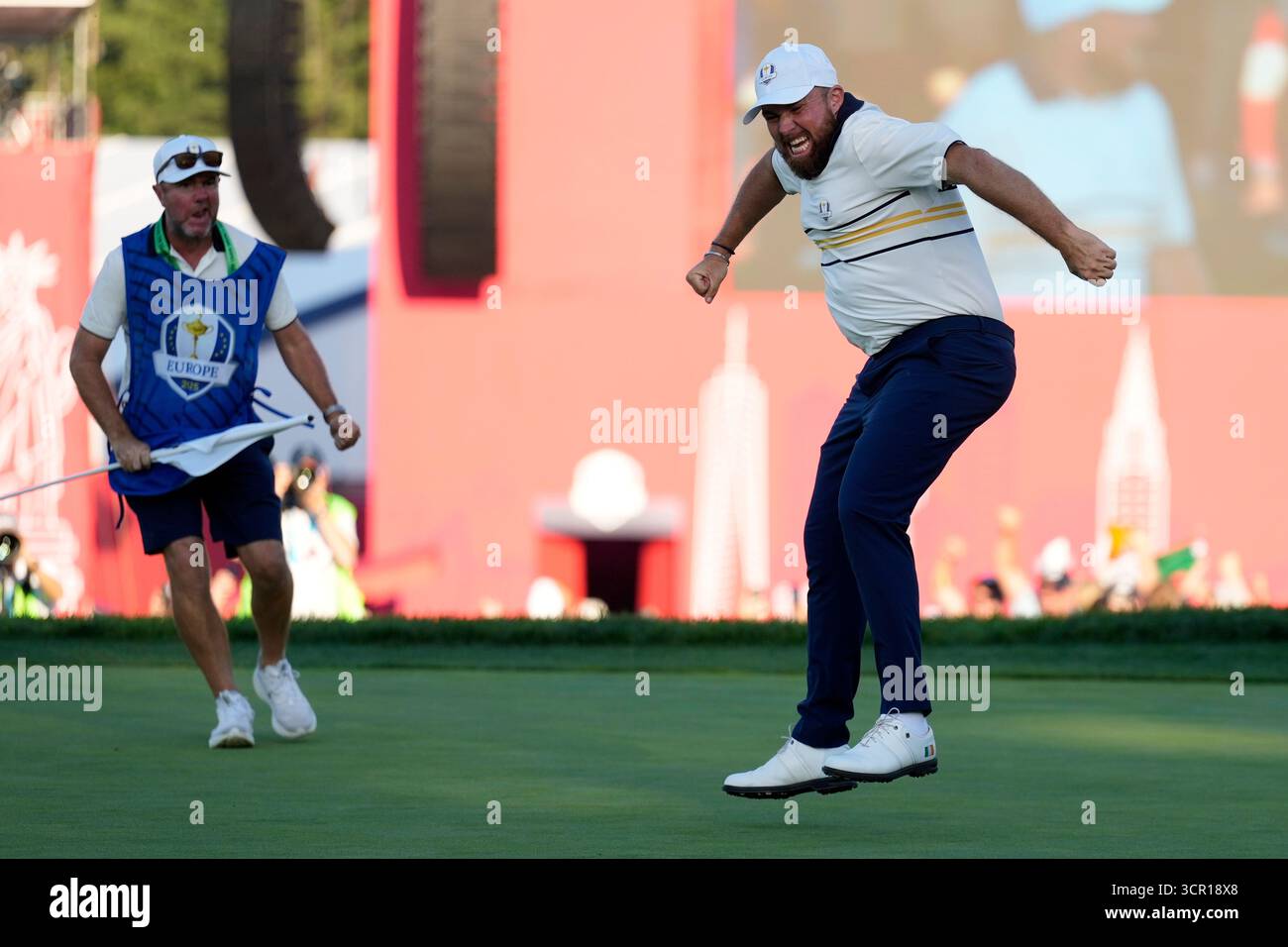 Europe's Shane Lowry celebrates after making the winning putt on the ...
