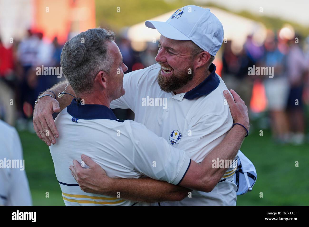 Europe's Shane Lowry celebrates with captain Luke Donald after making ...