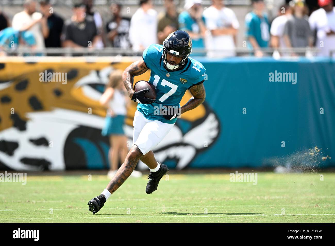 Jacksonville Jaguars wide receiver Tim Patrick (17) warms up before an ...
