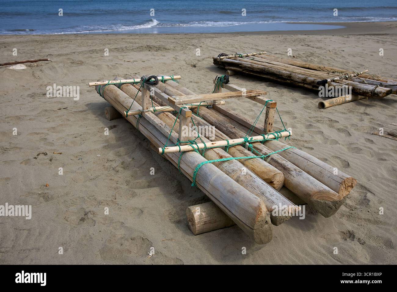 This traditional balsa raft, a historical fishing vessel, reflects the ...
