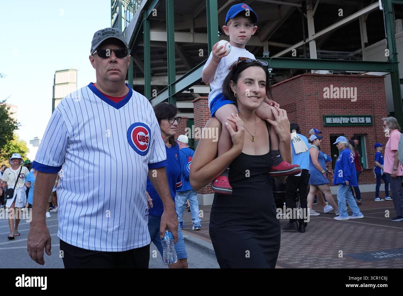 Chicago Cubs fans leave after the Cubs defeated the St. Louis Cardinals ...