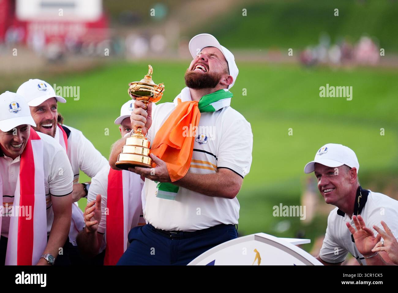 Shane Lowry of Team Europe celebrates with the Ryder Cup Trophy on day ...