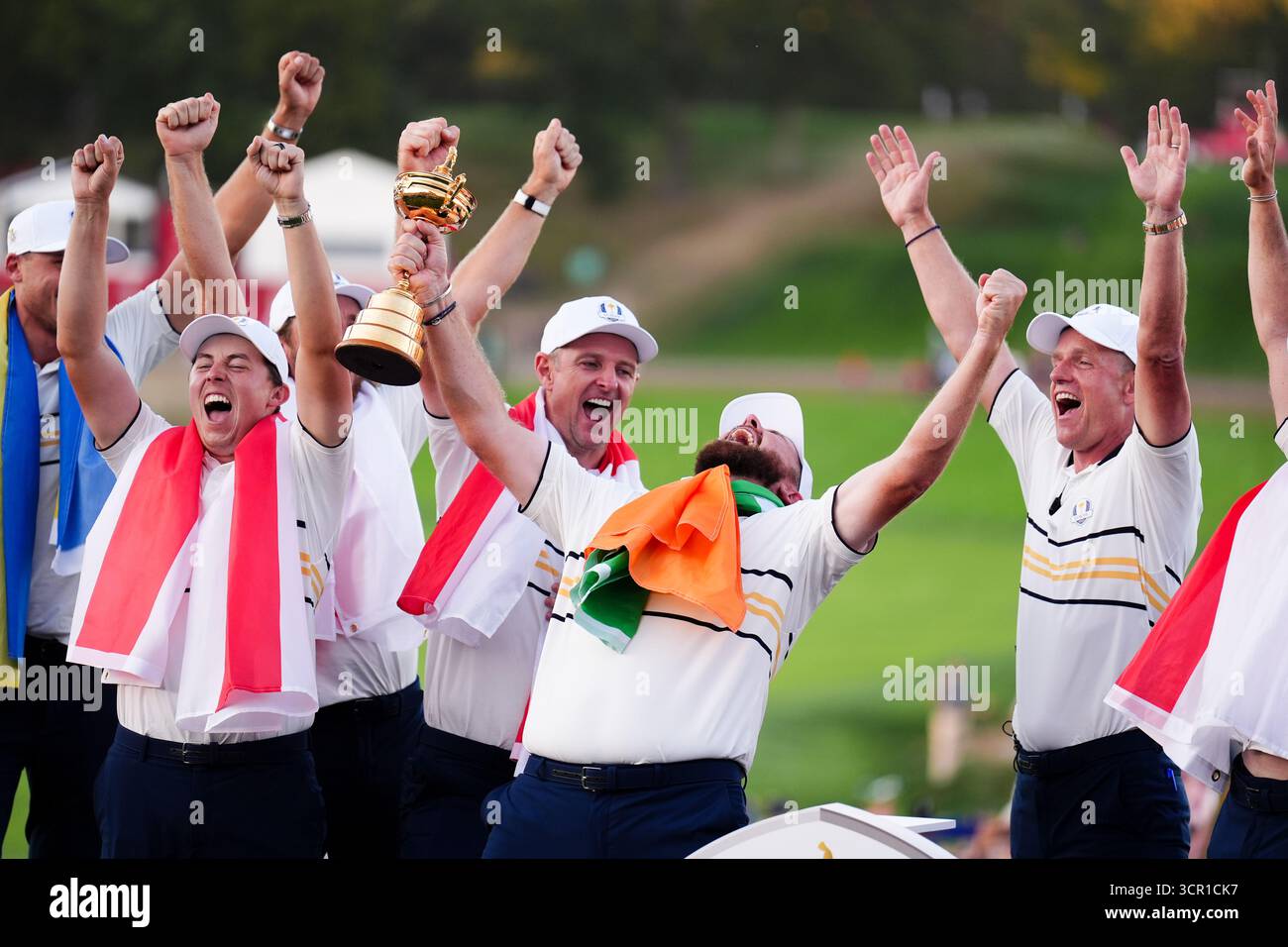Shane Lowry of Team Europe celebrates with the Ryder Cup Trophy on day ...