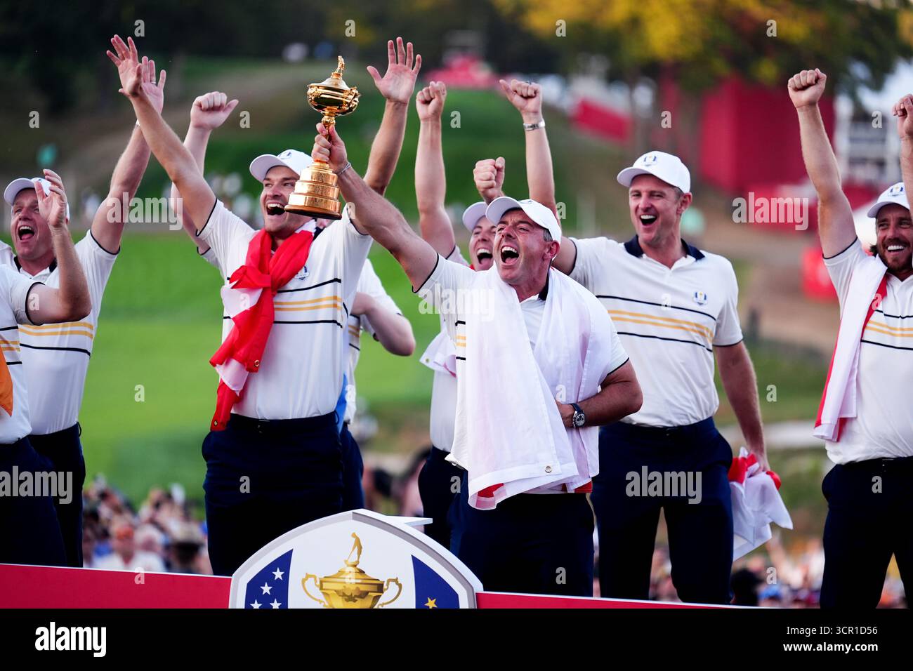 Rory McIlroy of Team Europe celebrates with the Ryder Cup Trophy on day ...