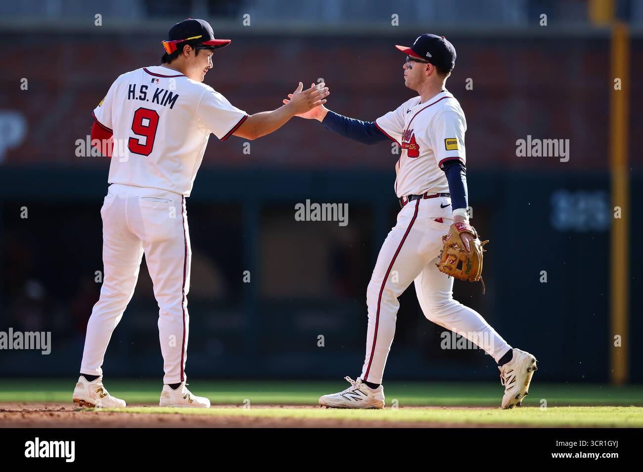 Atlanta Braves' Ha-Seong Kim (9) high-fives Nick Allen, right, after a ...