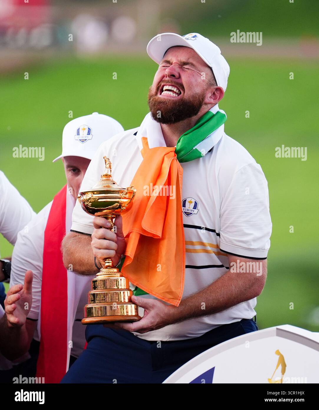 Shane Lowry of Team Europe celebrates with the Ryder Cup Trophy on day ...