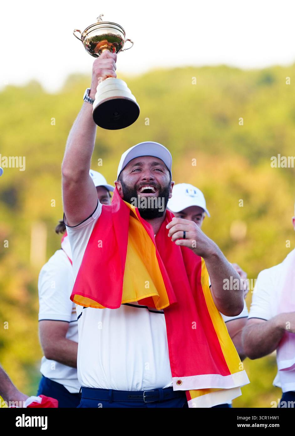 Jon Rahm of Team Europe celebrates with the Ryder Cup Trophy on day ...