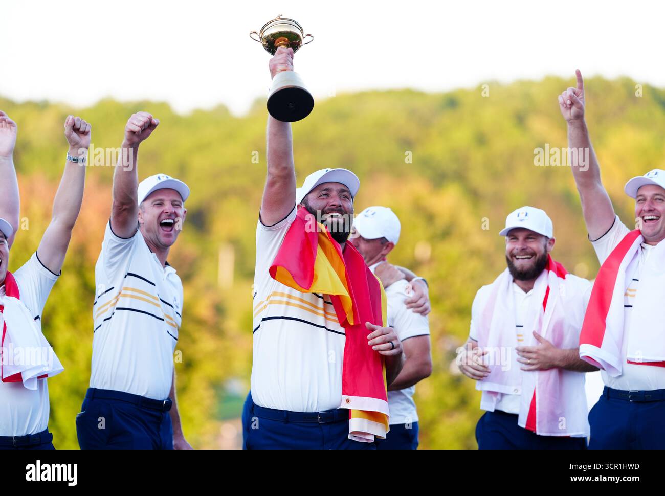 Jon Rahm of Team Europe celebrates with the Ryder Cup Trophy on day ...