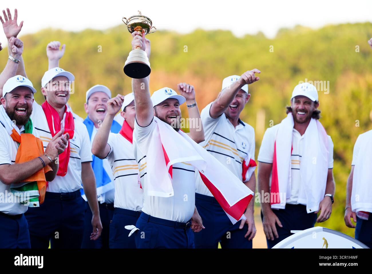 Tyrrell Hatton of Team Europe celebrates with the Ryder Cup Trophy on ...