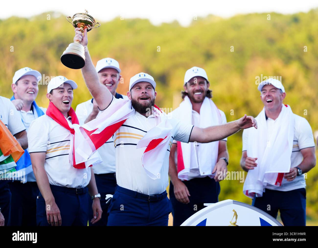 Tyrrell Hatton of Team Europe celebrates with the Ryder Cup Trophy on ...
