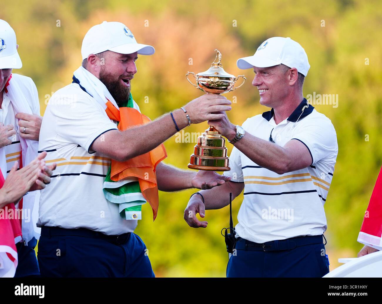 Shane Lowry of Team Europe and captain Luke Donald with the Ryder Cup ...
