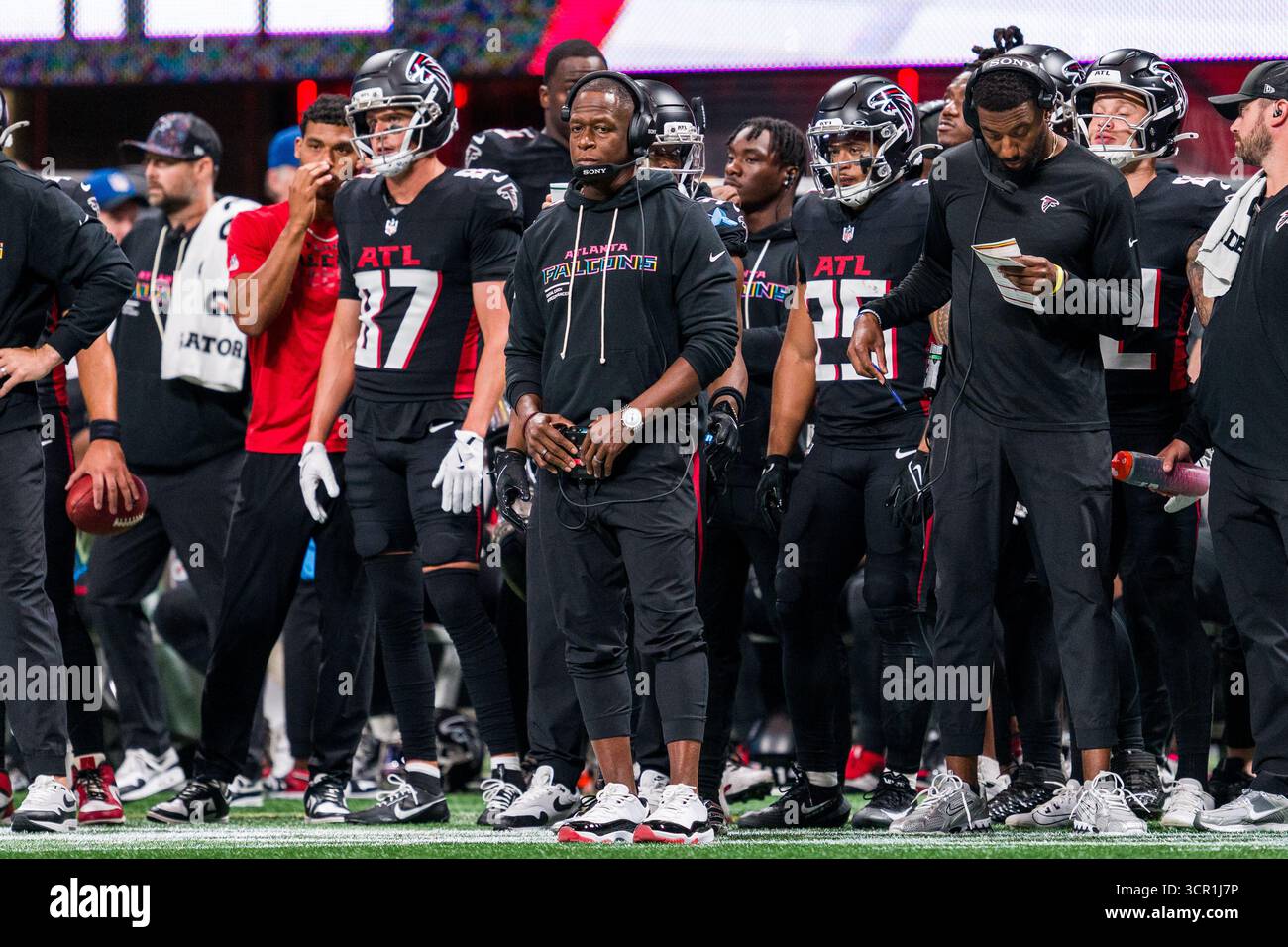 Atlanta Falcons head coach Raheem Morris works during the first half of ...