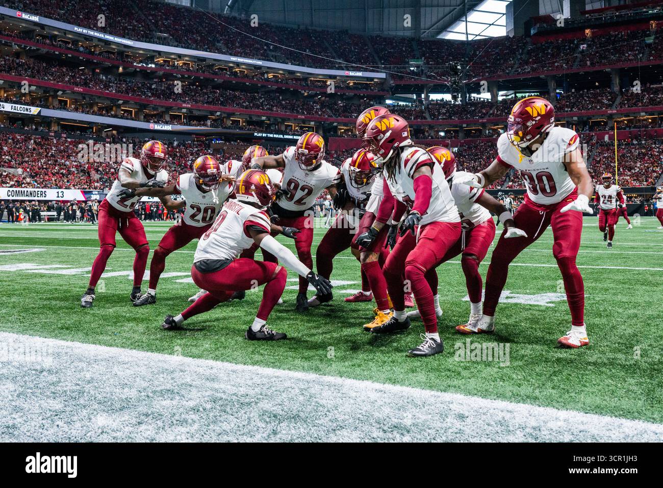 Washington Commanders cornerback Mike Sainristil (0) celebrates an ...