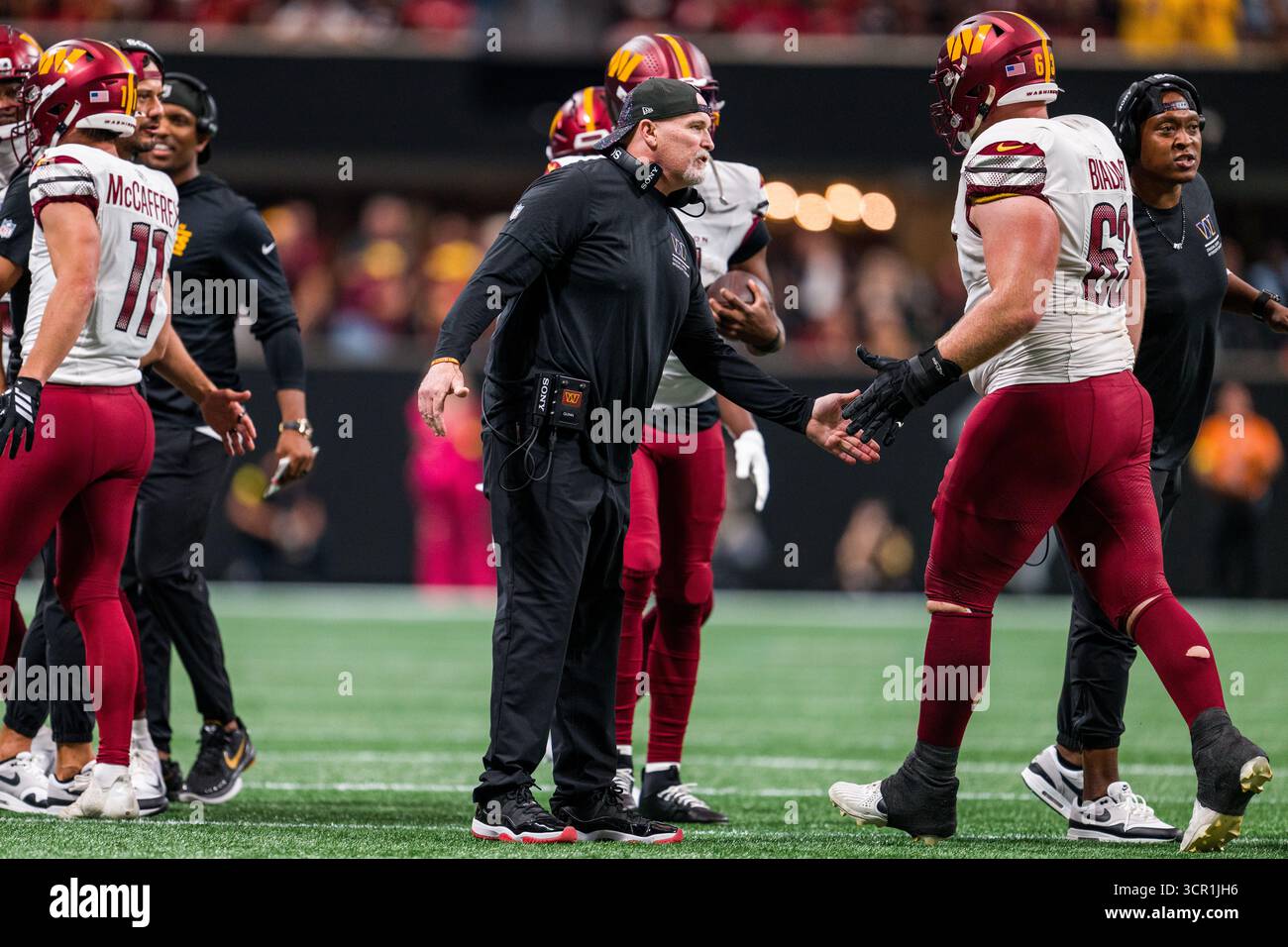 Washington Commanders head coach Dan Quinn celebrates with Washington ...