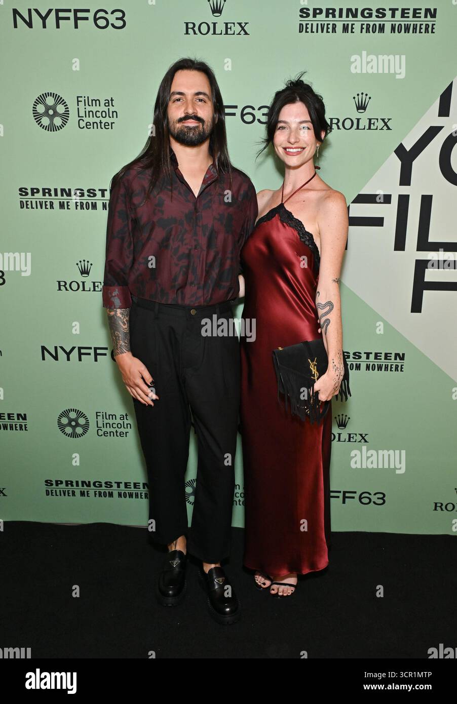 Jay Weinberg, left, and Chloe Howcroft Weinberg attend the premiere of ...