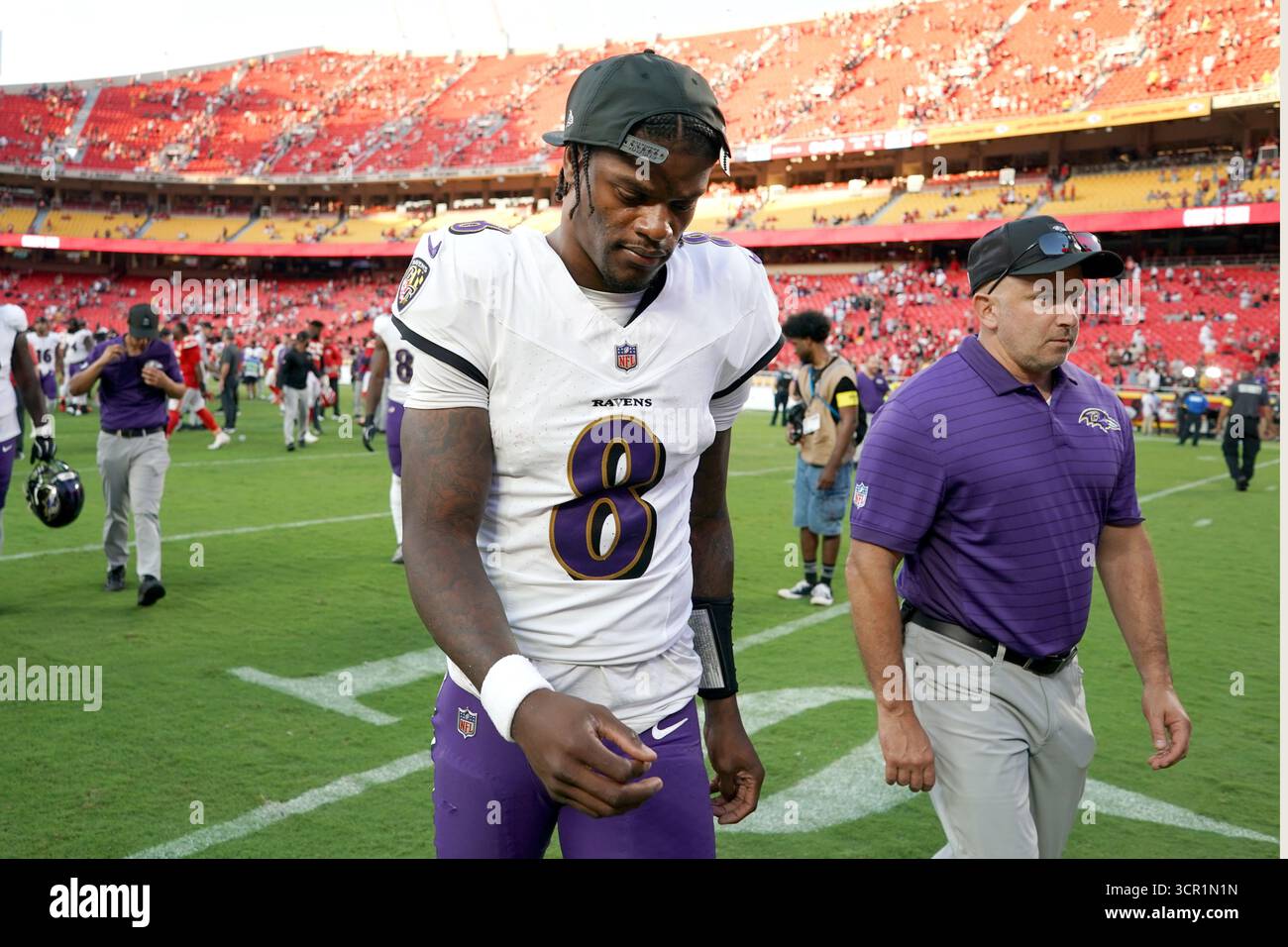 Baltimore Ravens quarterback Lamar Jackson heads off the field ...