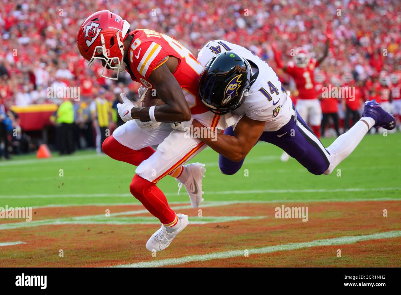 Kansas City Chiefs wide receiver Tyquan Thornton (80) scores a touchdown while being tackled by ...