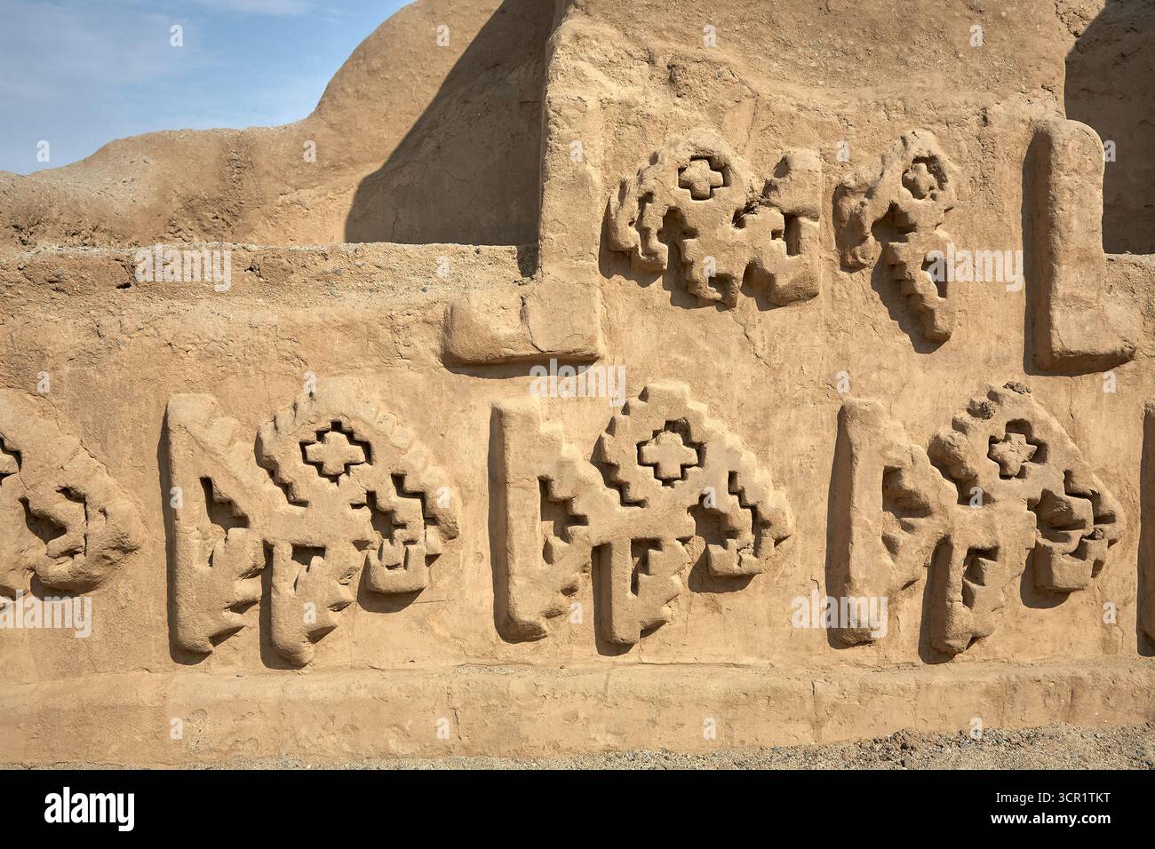 the vast adobe walls of Chan Chan, the largest mud-brick city in the ...