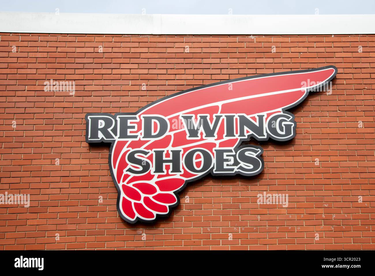 Red Wing, Minnesota. Logo of the exterior of the Red Wing shoe company ...