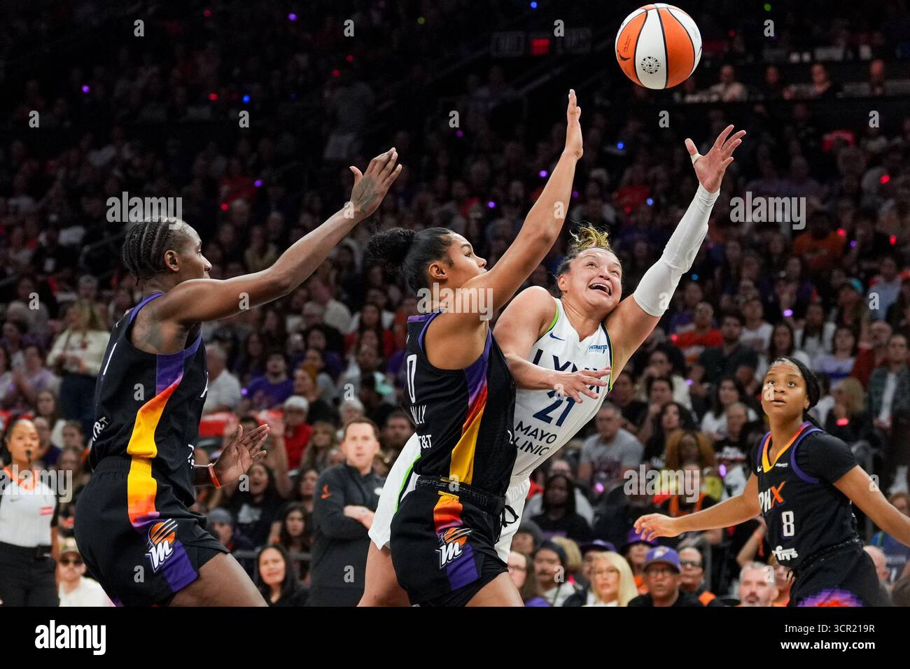 Phoenix Mercury forward Satou Sabally, center, fouls Minnesota Lynx ...