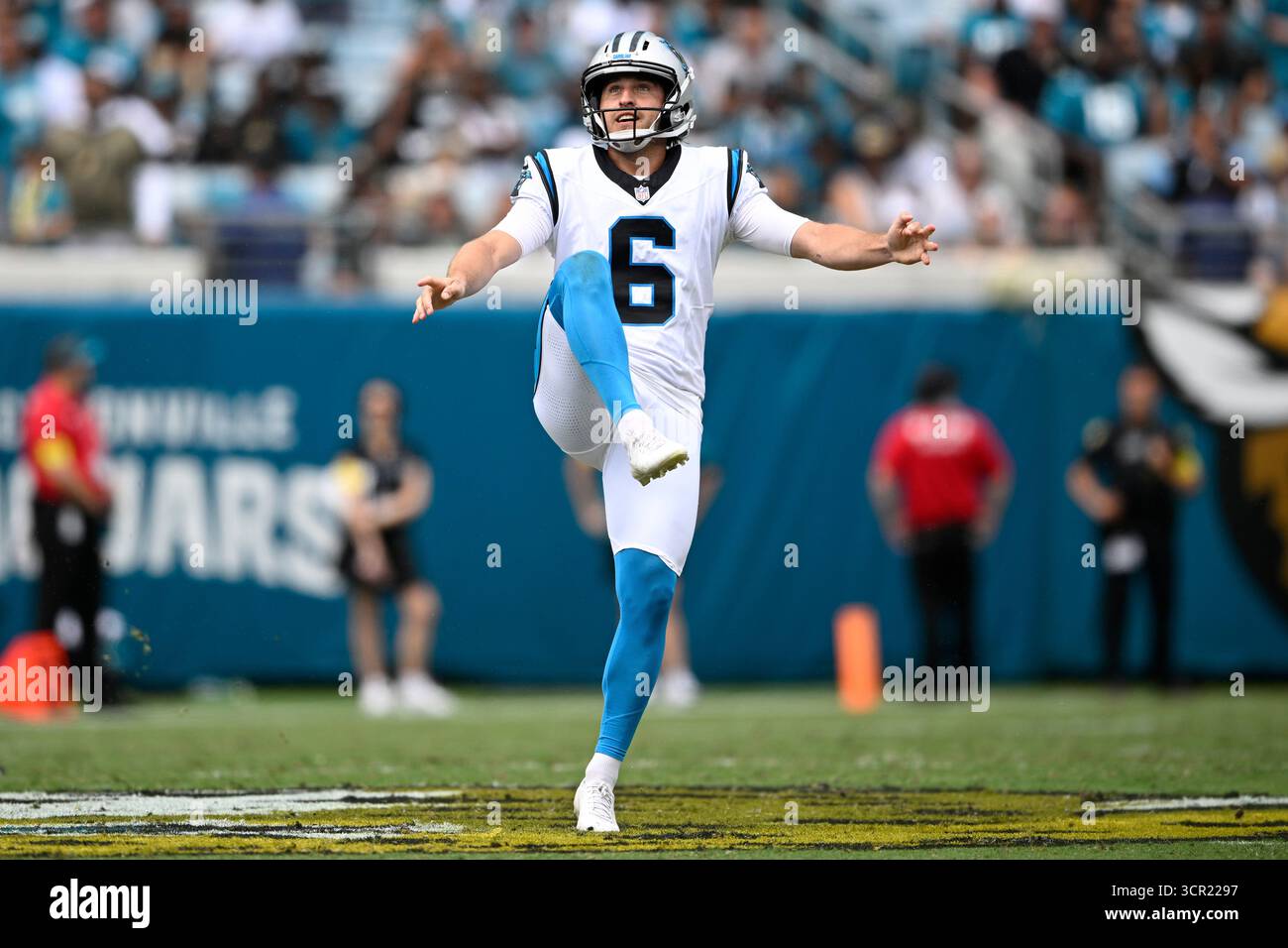 Carolina Panthers punter Sam Martin (6) watches the flight of the ball ...
