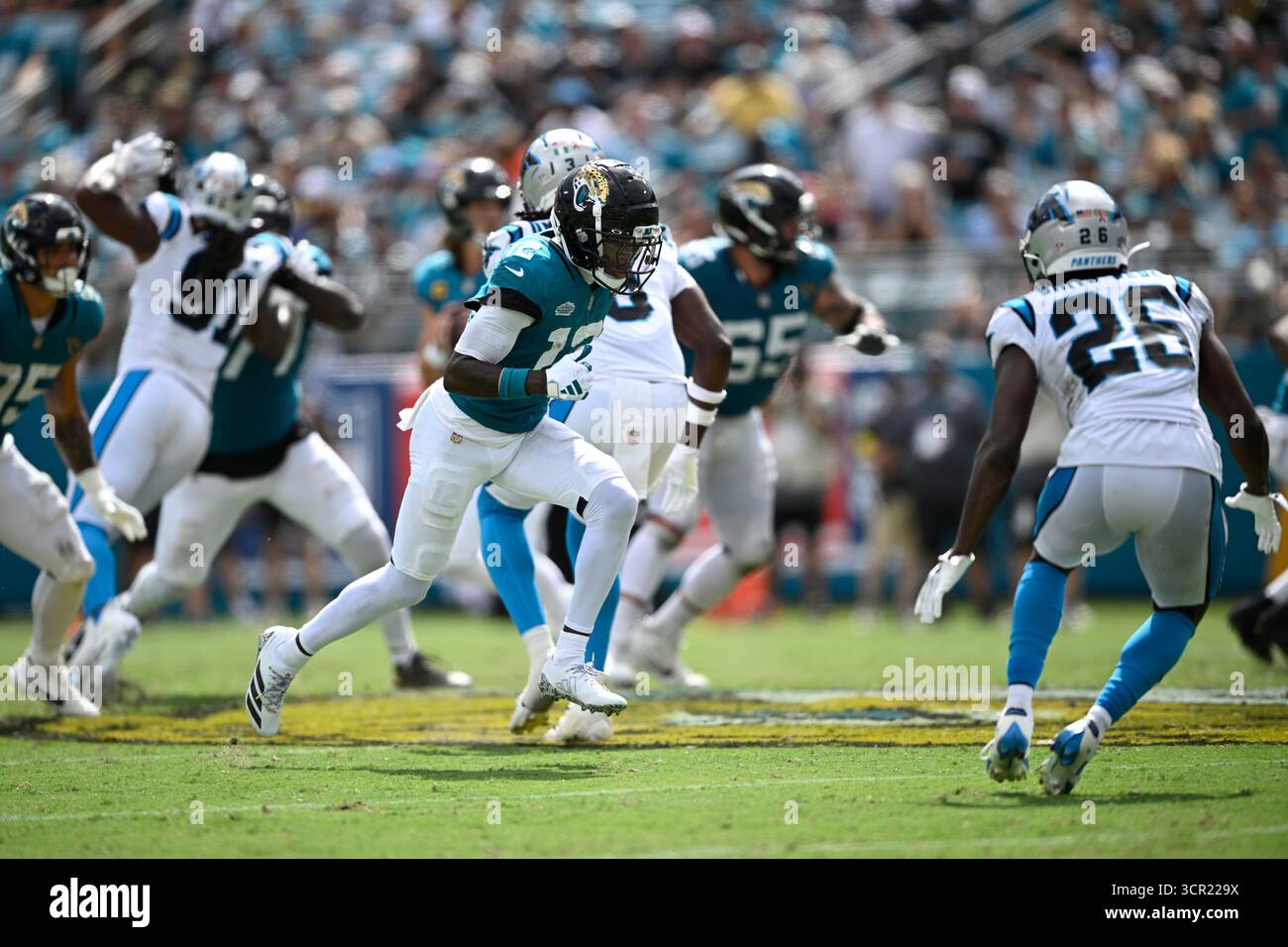 Jacksonville Jaguars wide receiver Travis Hunter (12) runs against the ...